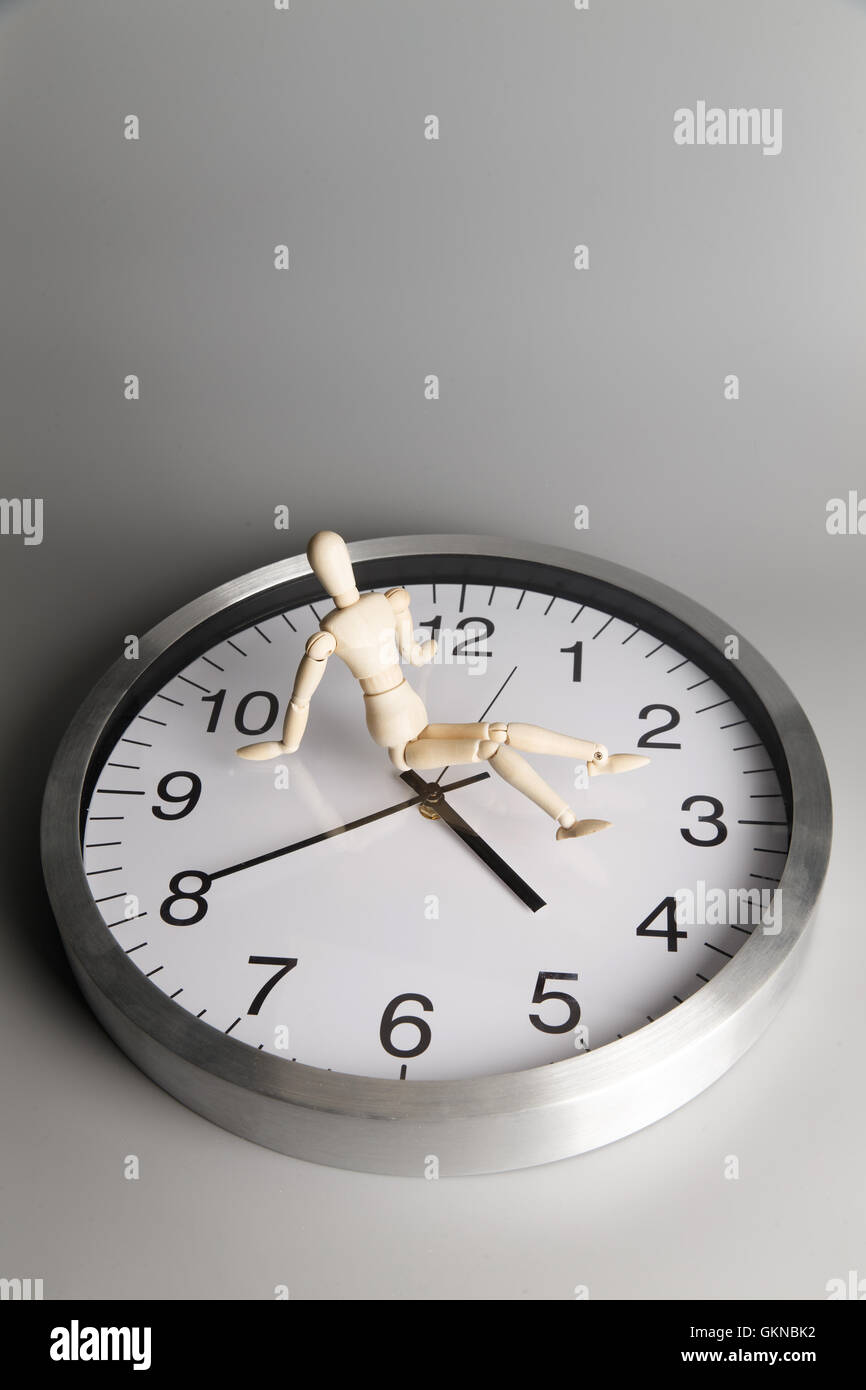 Puppet and clock Stock Photo - Alamy