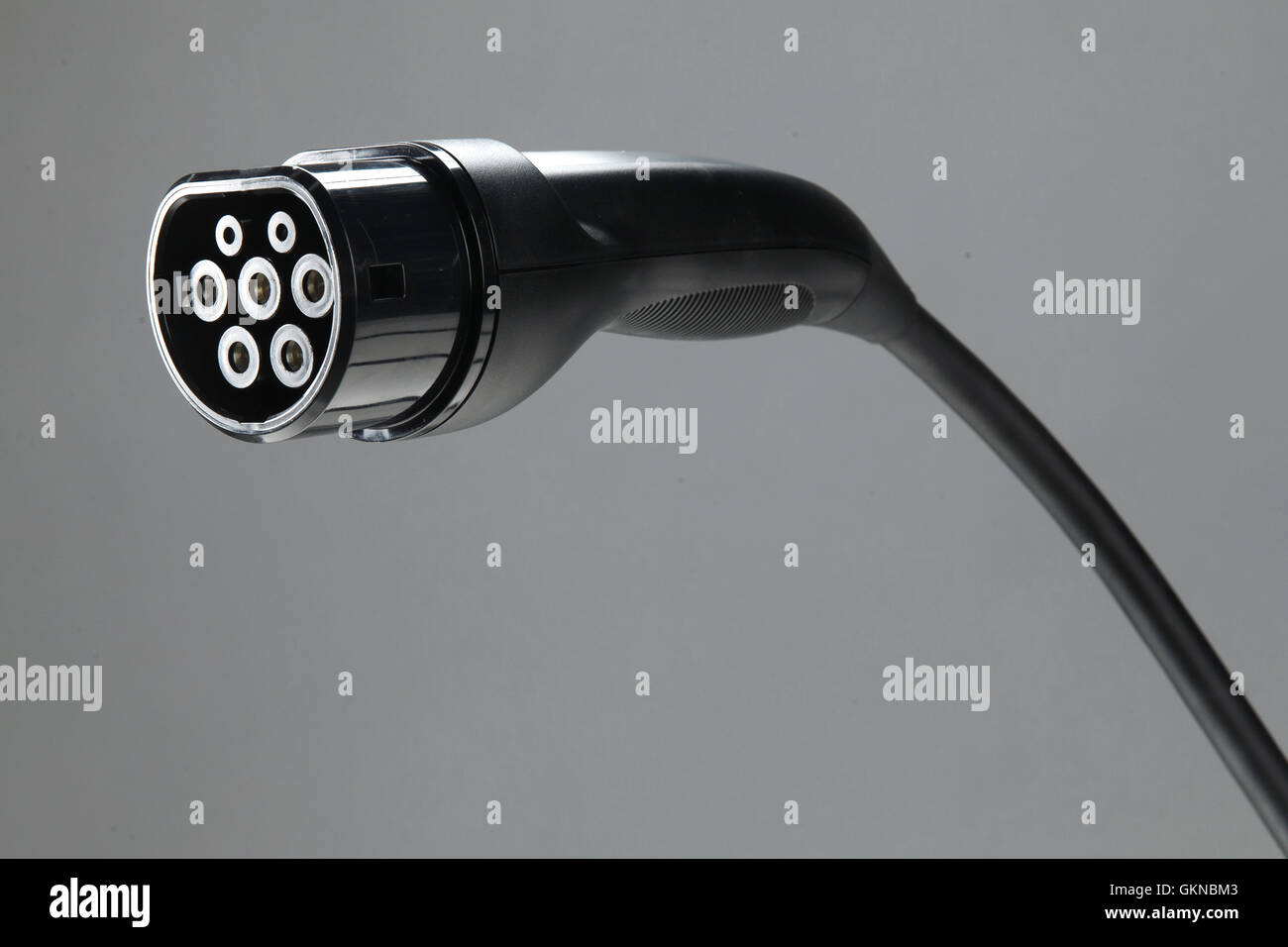 Automobile charging handle Stock Photo - Alamy