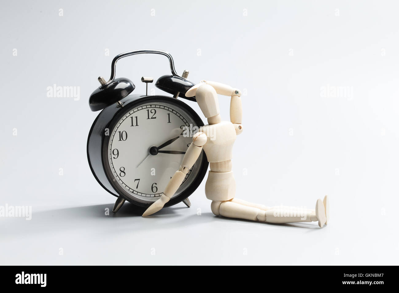 Puppet and alarm clock Stock Photo - Alamy