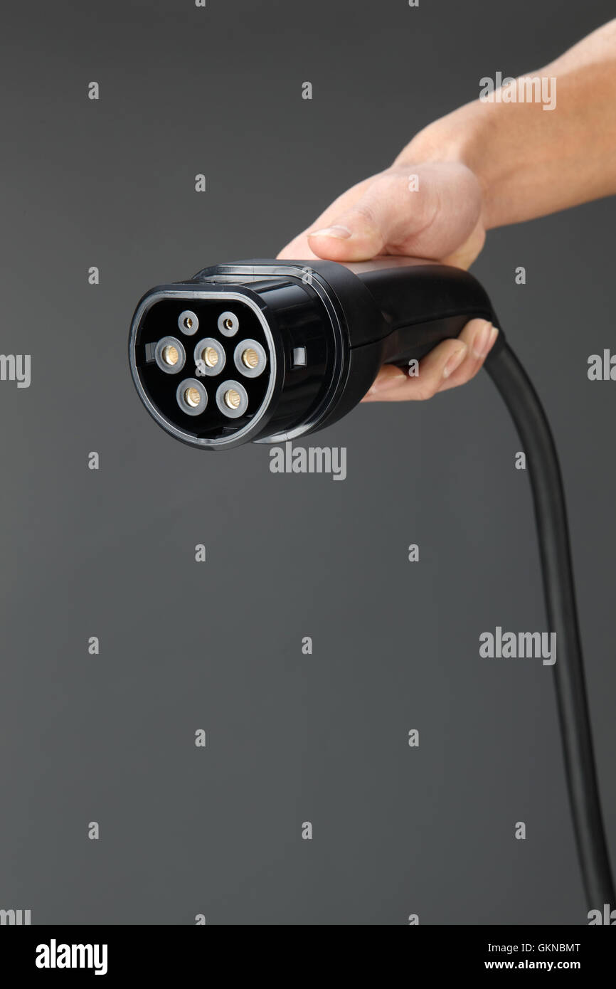 Automobile charging handle Stock Photo - Alamy