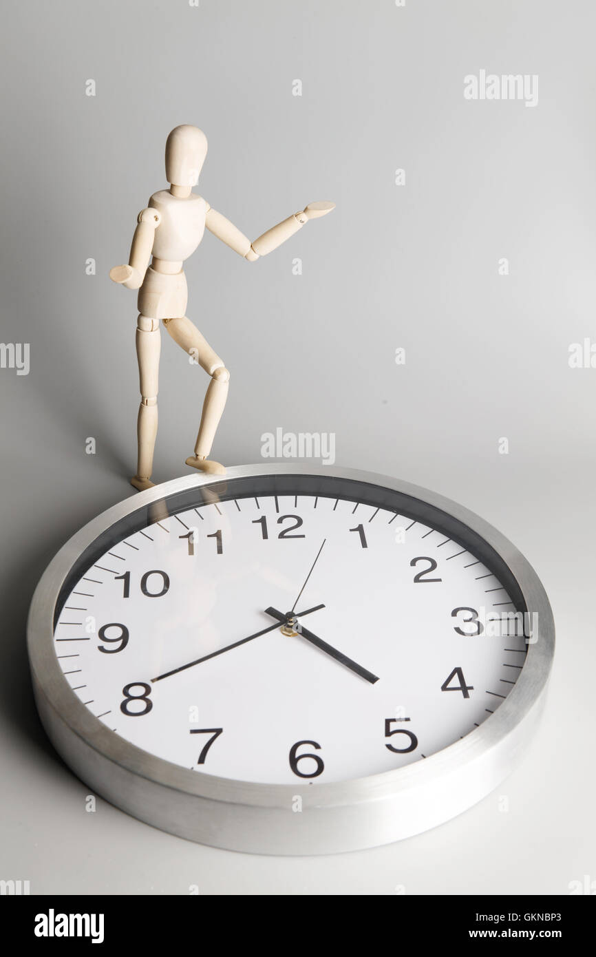 Puppet and alarm clock Stock Photo - Alamy