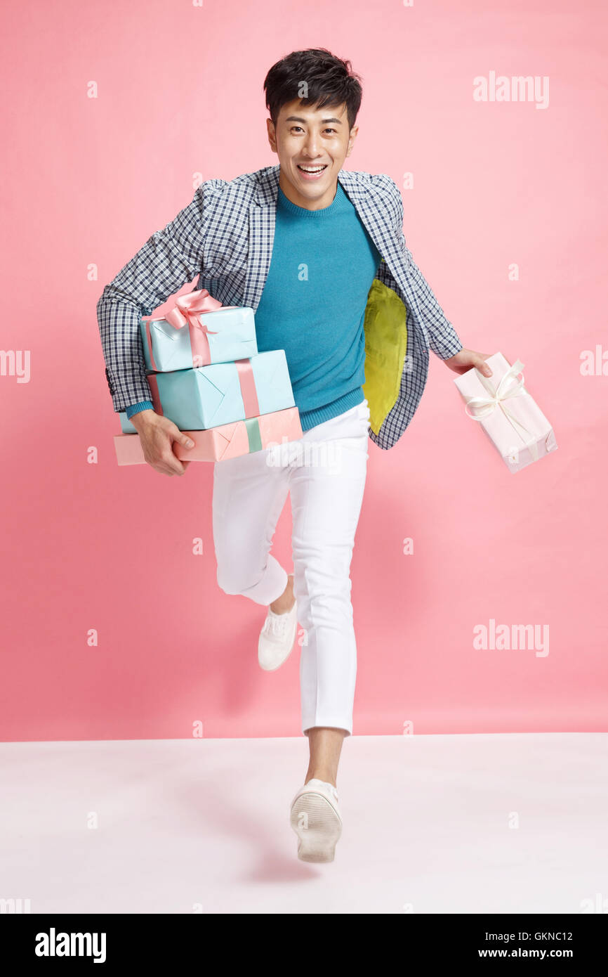 The young man took the gift of fashion Stock Photo - Alamy