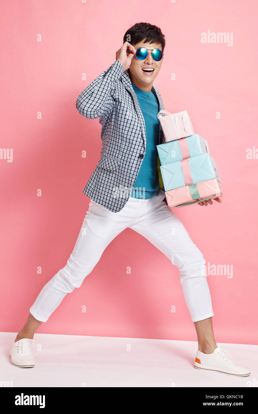 The young man took the gift of fashion Stock Photo - Alamy