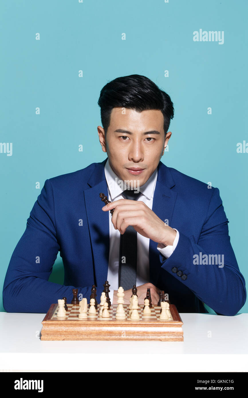 Indian man playing chess hi-res stock photography and images - Alamy