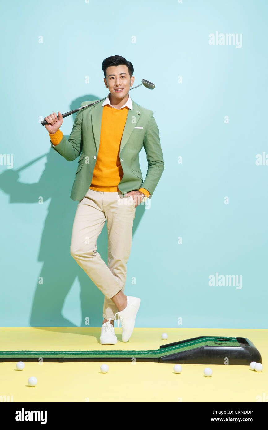 Playing golf at office hi-res stock photography and images - Alamy