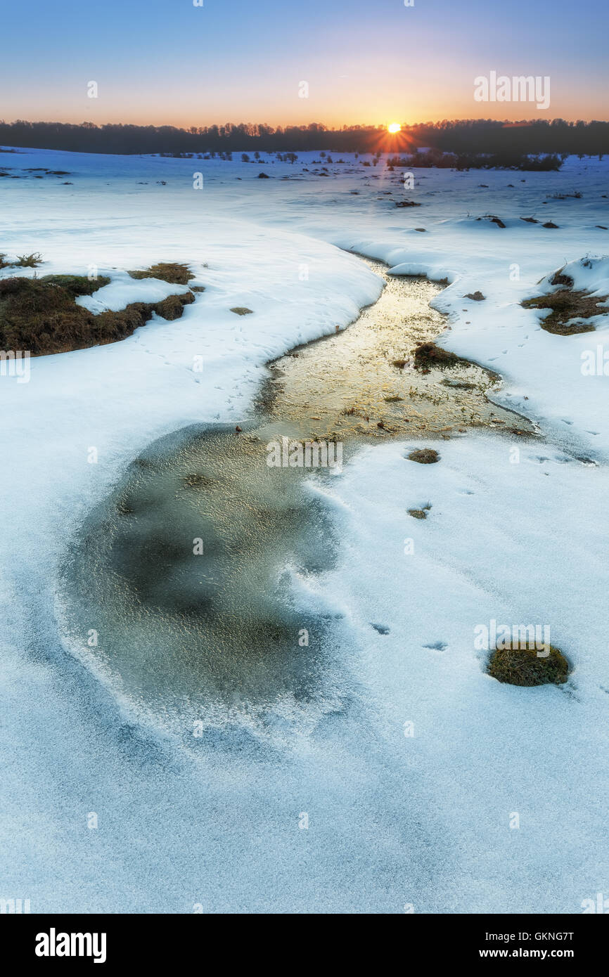 Sunrise in a cold winter morning Stock Photo - Alamy