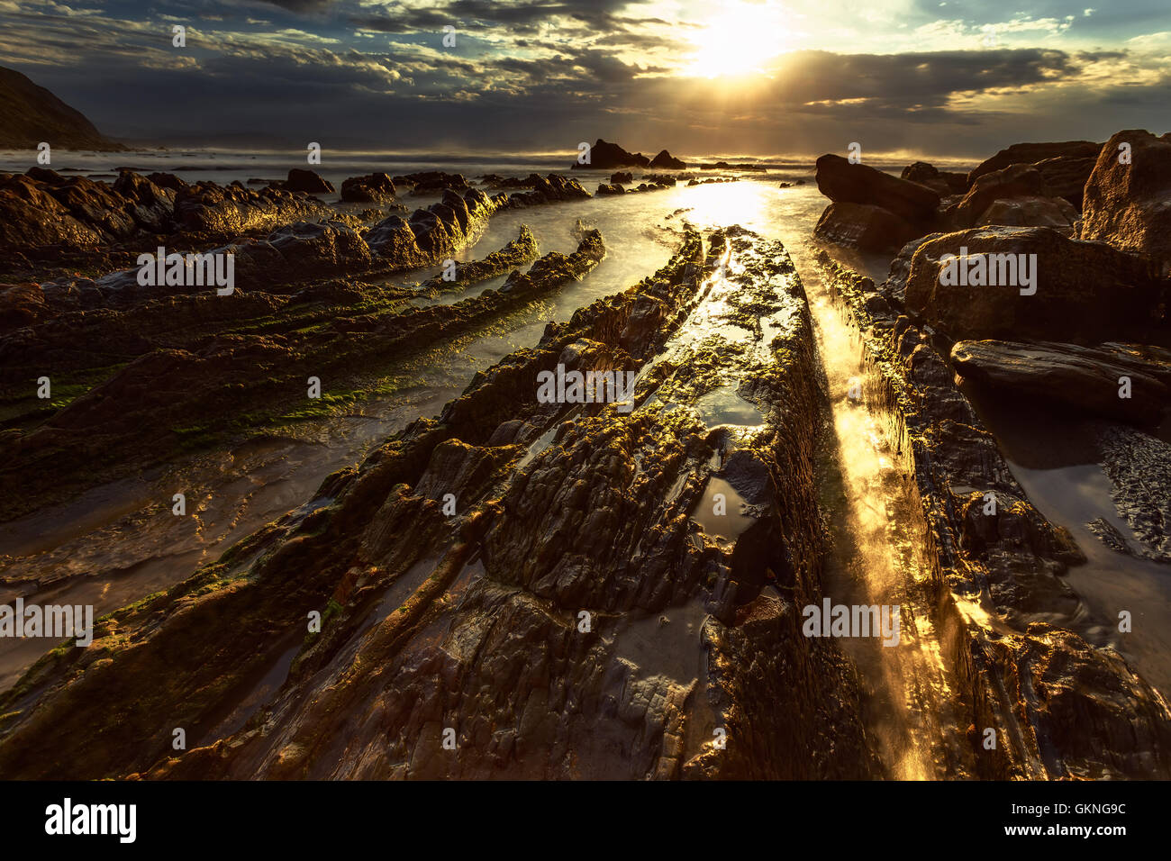 Sunset at Barrika beach Stock Photo - Alamy