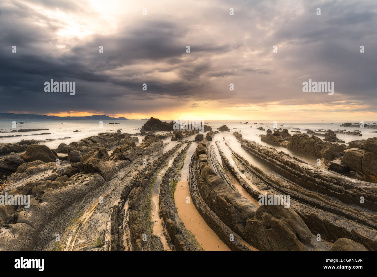 Sunset at Barrika beach Stock Photo - Alamy