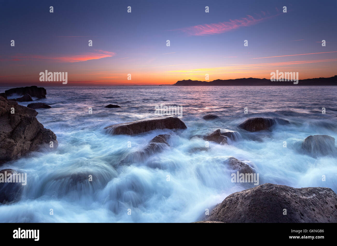 Sunrise at Arribolas beach Stock Photo - Alamy