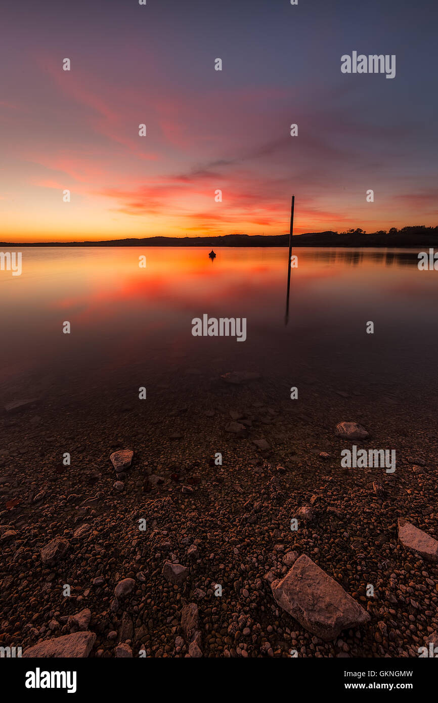 Sunset at the lake Stock Photo - Alamy