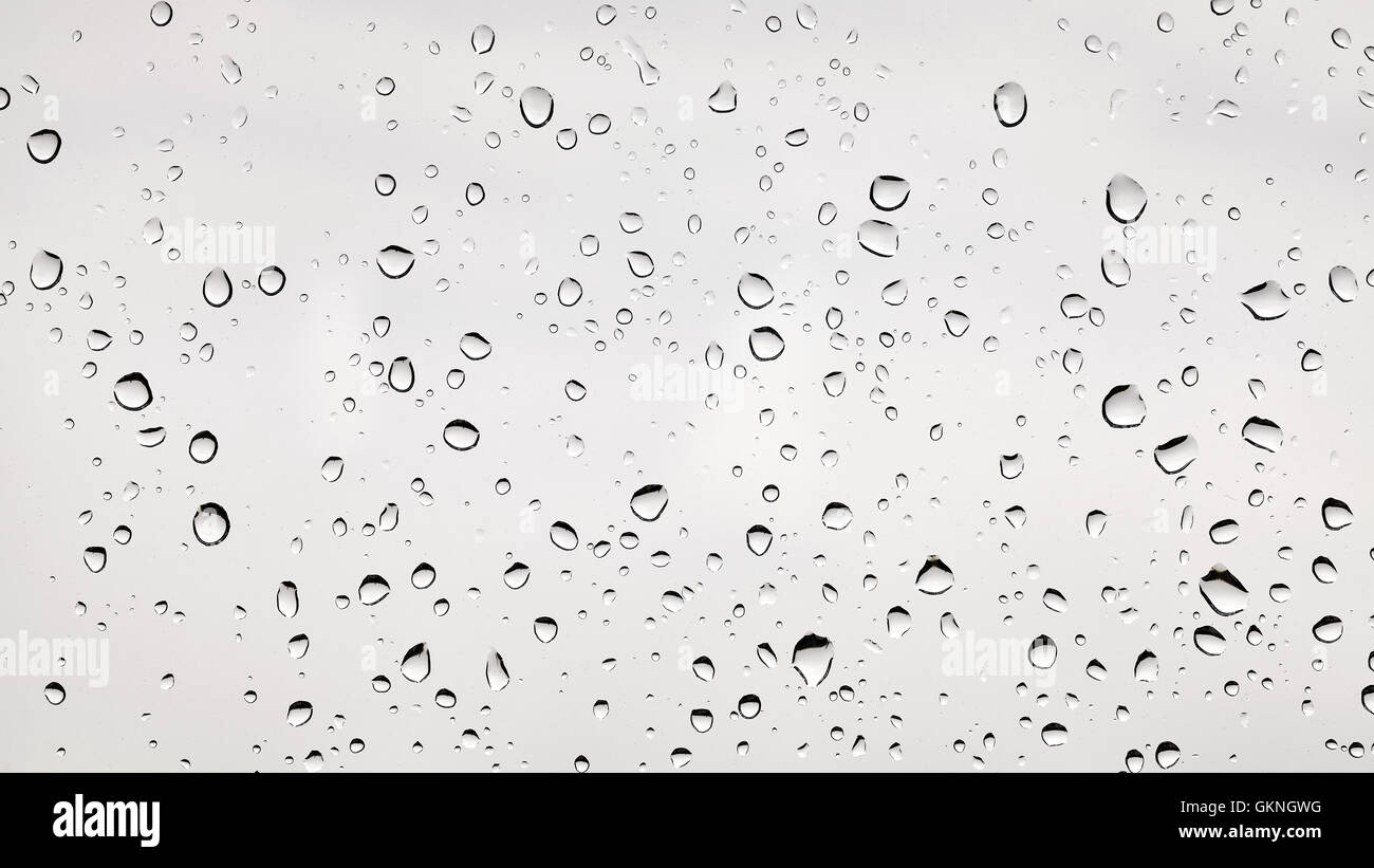 Photo of raindrops on a dusty glass Stock Photo - Alamy