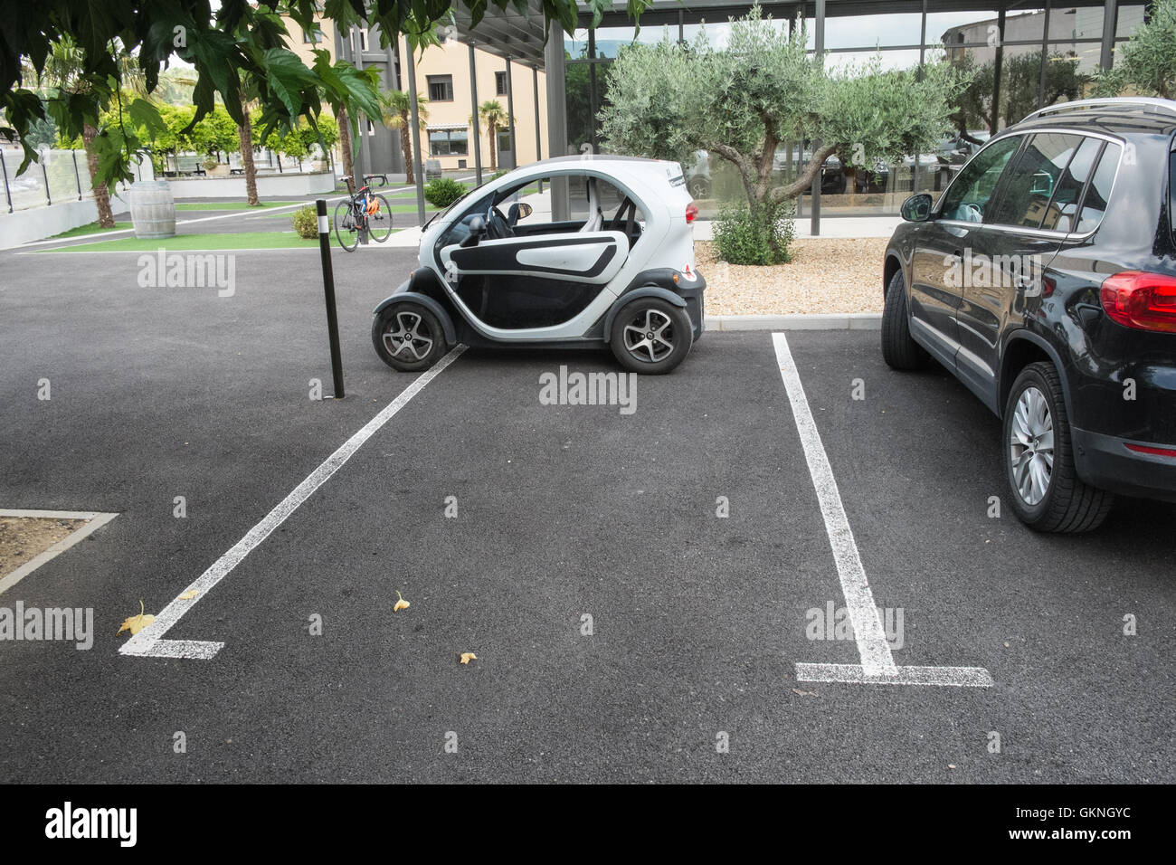 Small micro car a Renault Twizy electric car badly parked,or blatantly ...