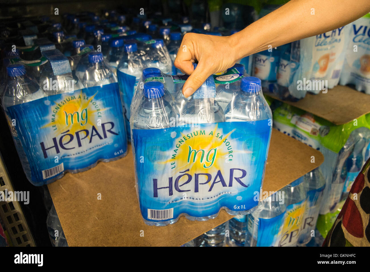 Huge selection of plastic bottled mineral water for sale at supermarket ...