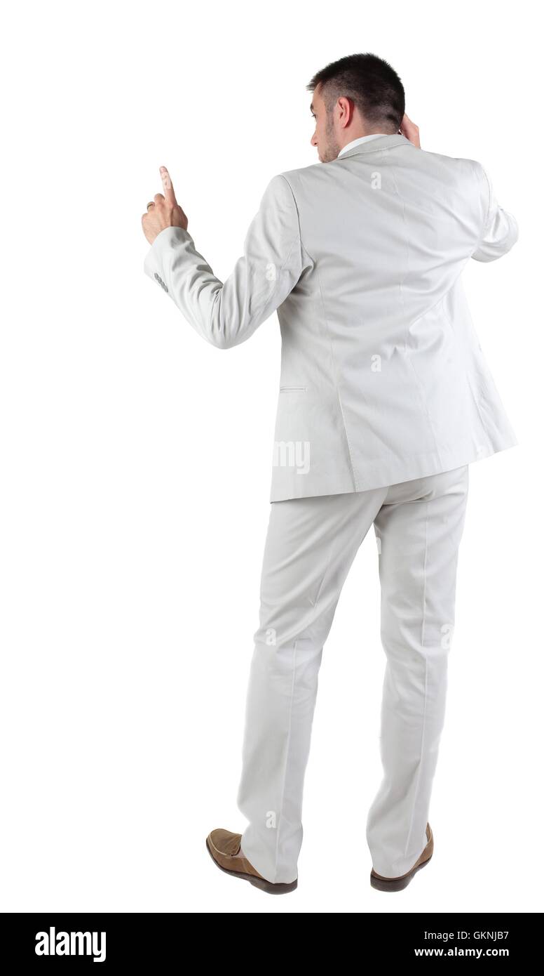 Back view of thinking young business man in white suit Stock Photo - Alamy