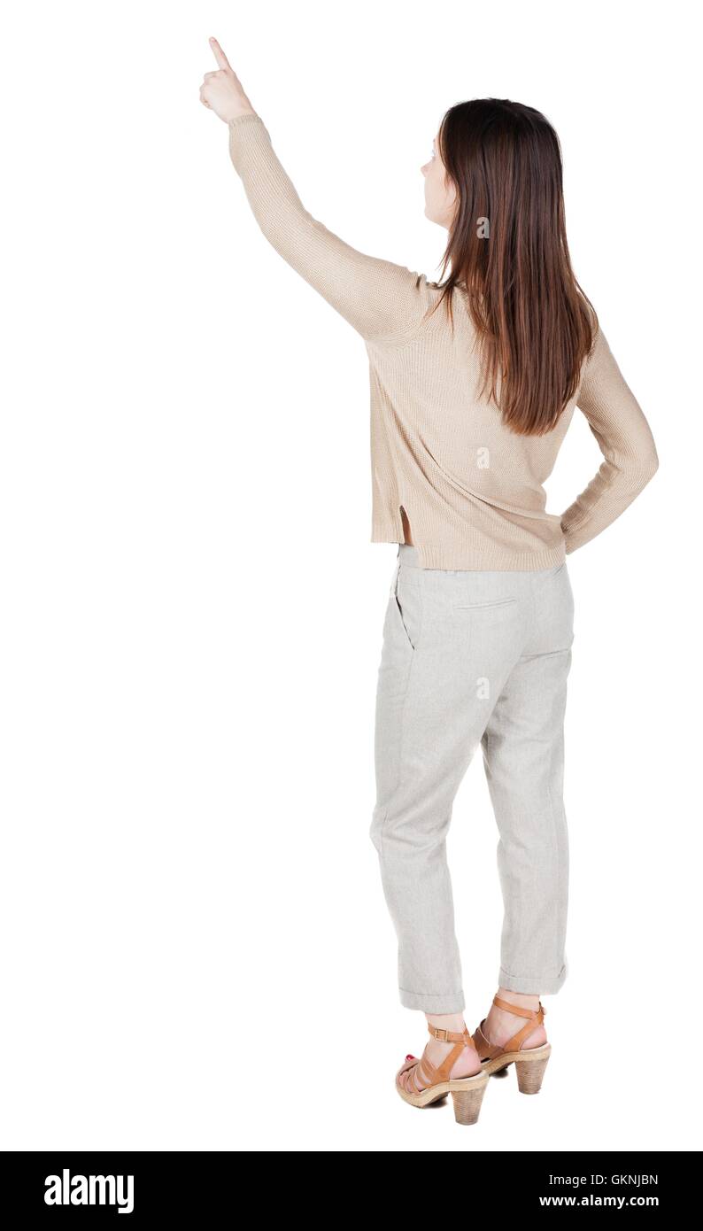 Back view of pointing woman Stock Photo - Alamy