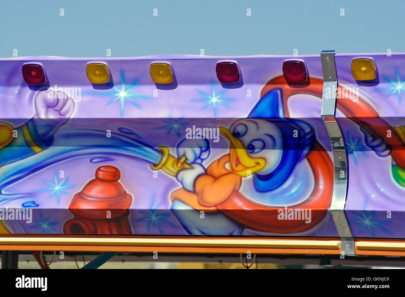 Painting a carousel for children with cartoon characters Stock Photo ...