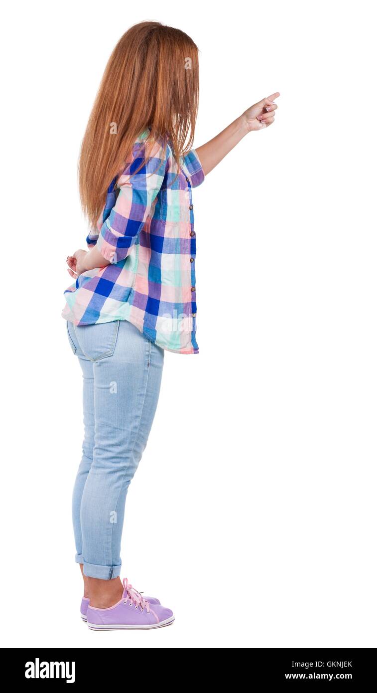 Back view of pointing woman Stock Photo - Alamy