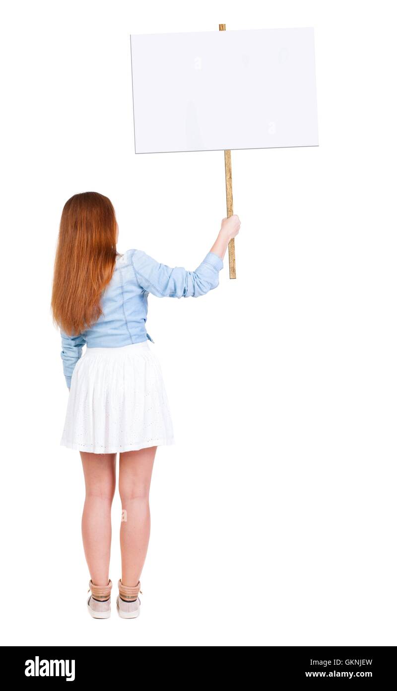 Back view of woman showing a sign board Stock Photo - Alamy
