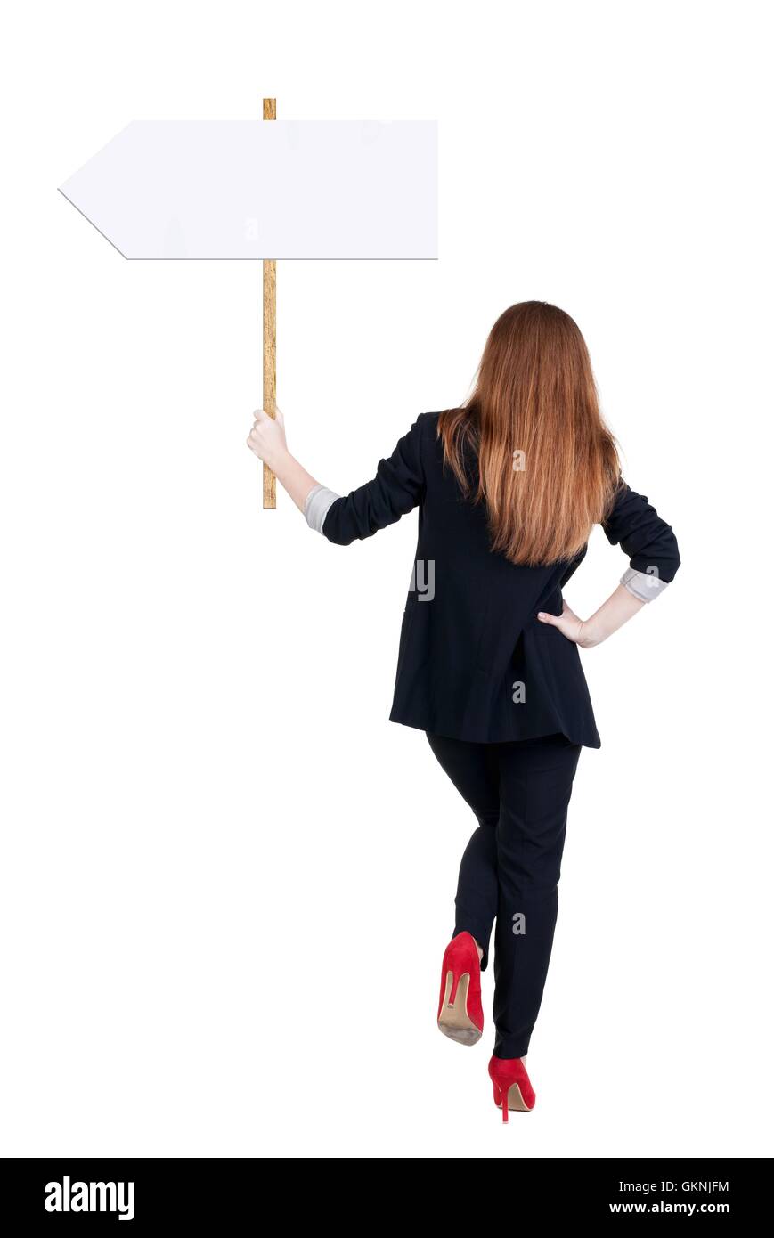 Back view business woman showing sign board Stock Photo - Alamy