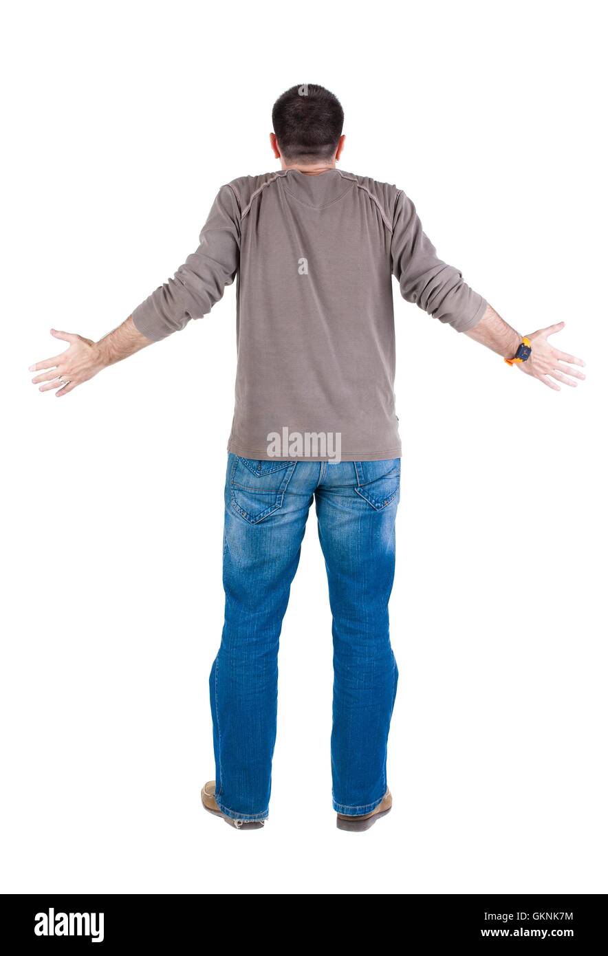 Back view of shocked and scared young man Stock Photo - Alamy