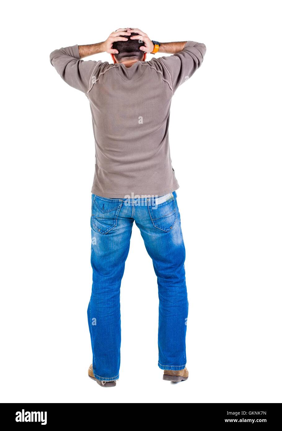 Back view of shocked and scared young man Stock Photo - Alamy