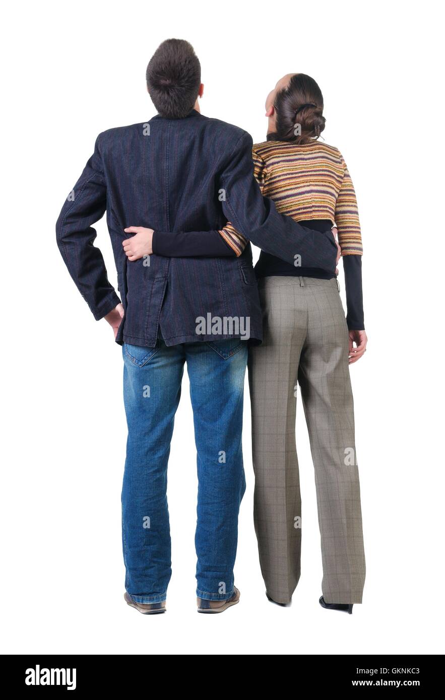 Young couple looks where that. Rear view Stock Photo - Alamy