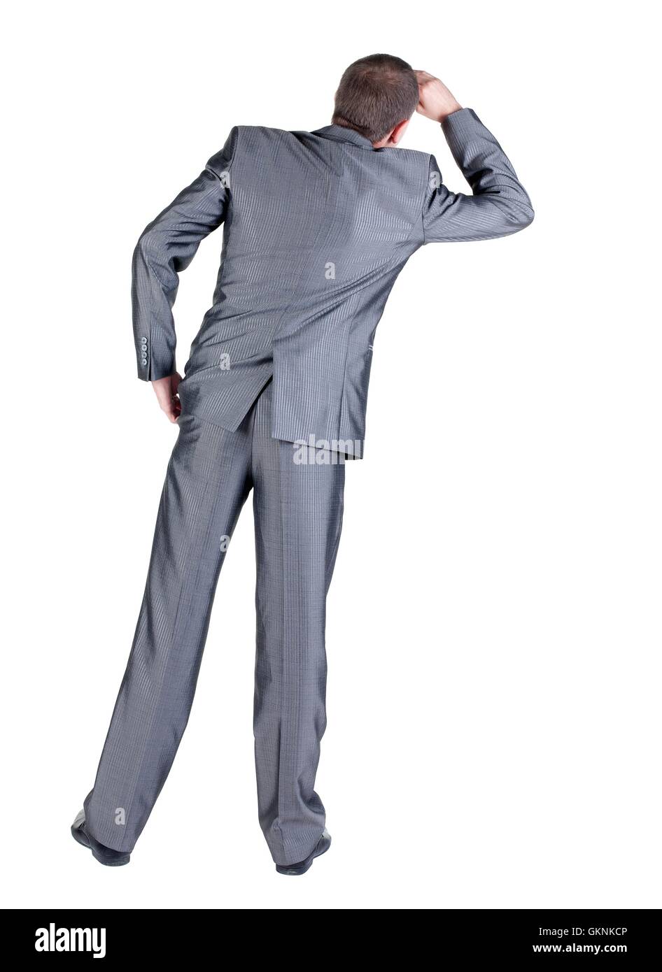 Businessman looks ahead. rear view Stock Photo - Alamy