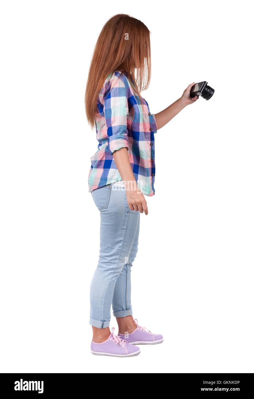 Back view of woman photographing Stock Photo - Alamy