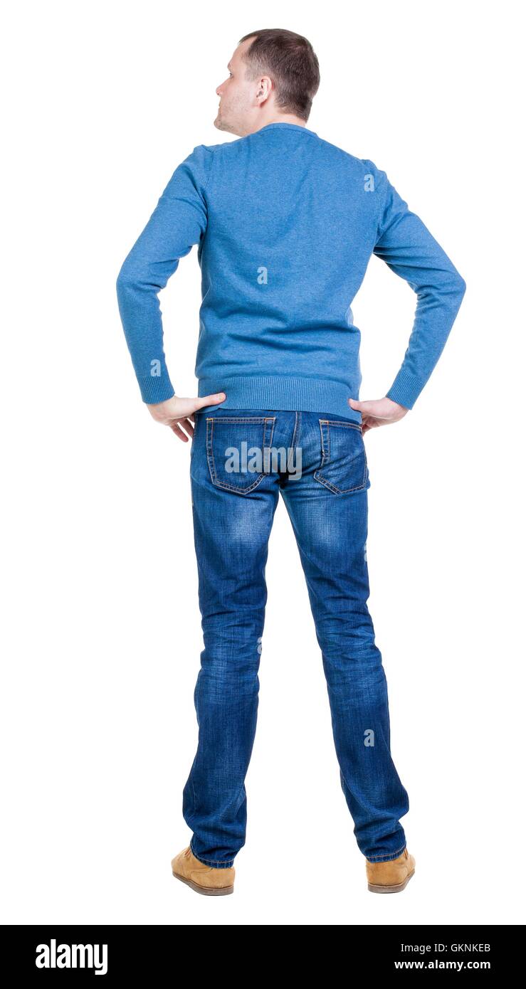Back view of handsome man in blue pullover looking up Stock Photo - Alamy