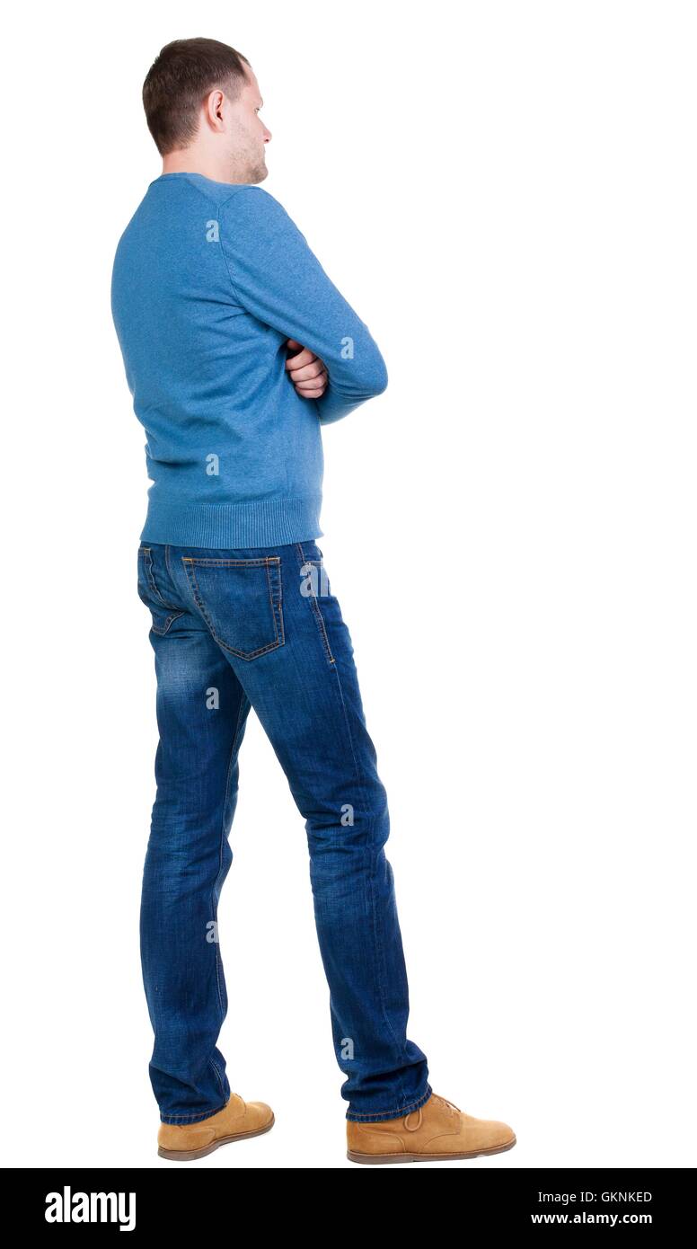 Back view of handsome man in blue pullover looking up Stock Photo - Alamy
