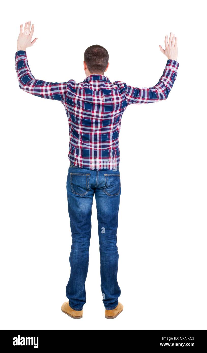 Back view of handsome man in checkered shirt lwaving from his h Stock ...