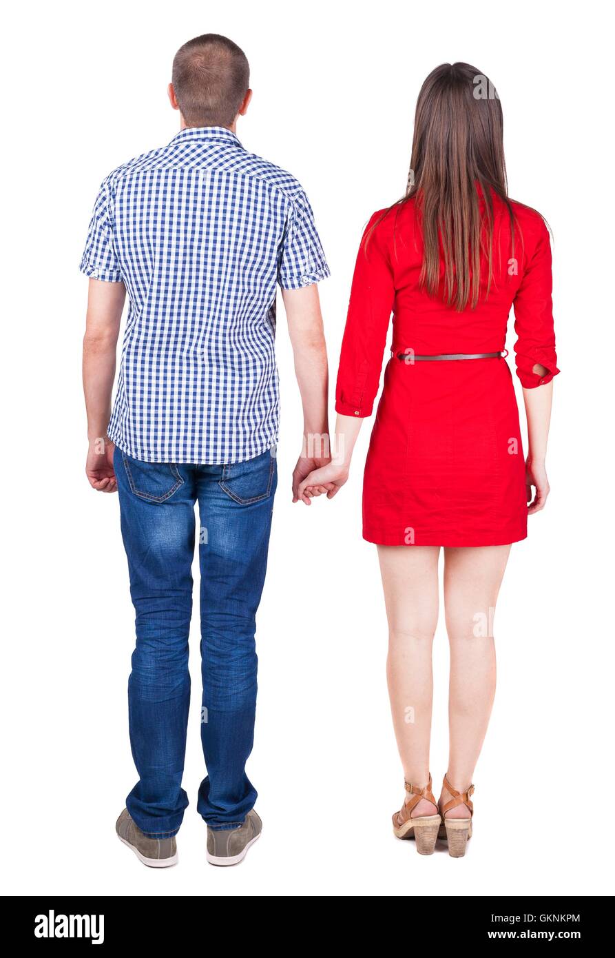 Back view of young embracing couple Stock Photo - Alamy