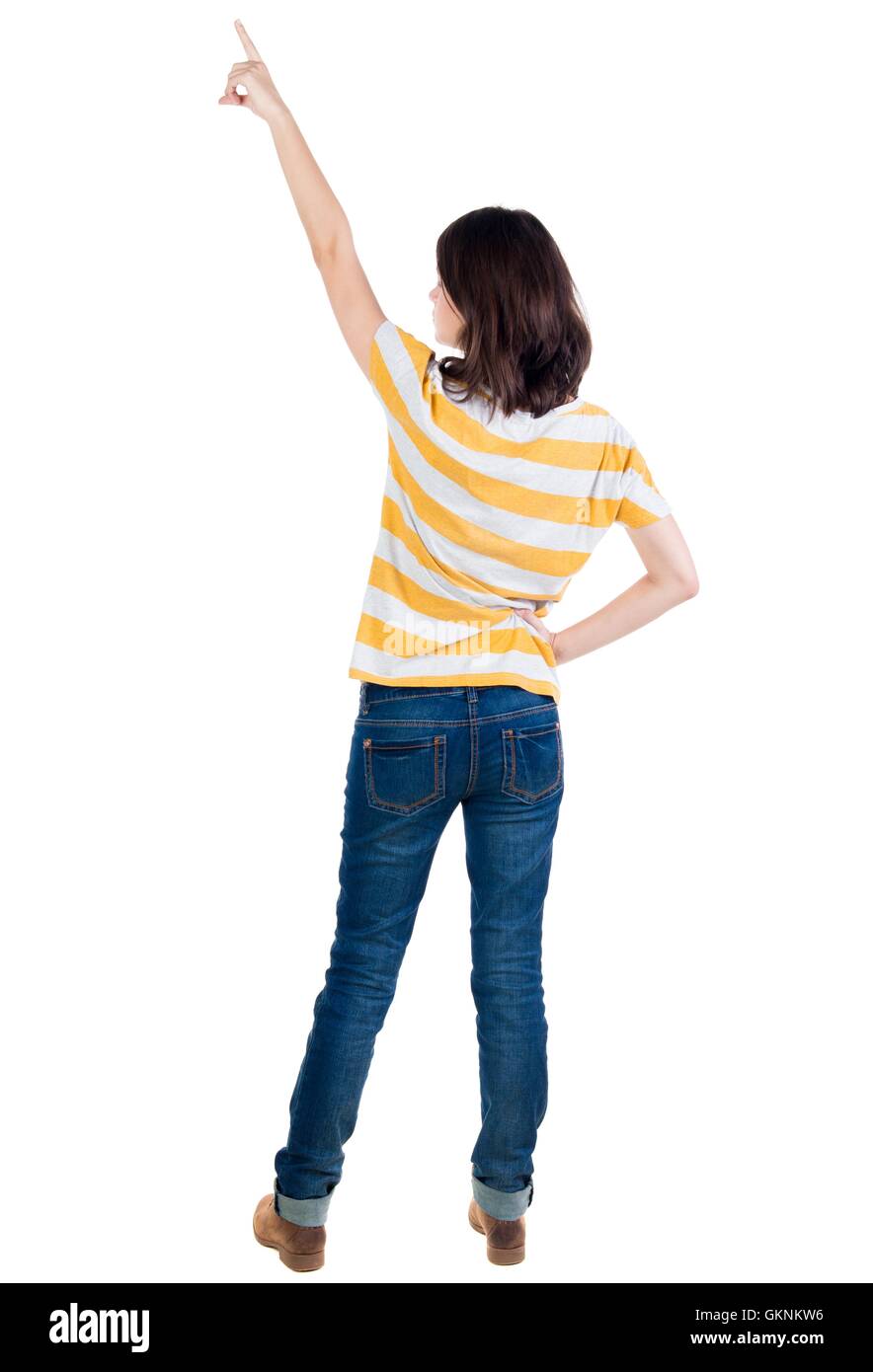 Back view of pointing woman Stock Photo - Alamy