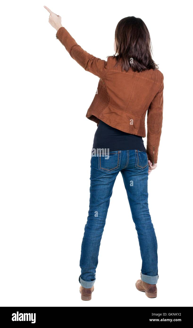 Back view of pointing woman Stock Photo - Alamy