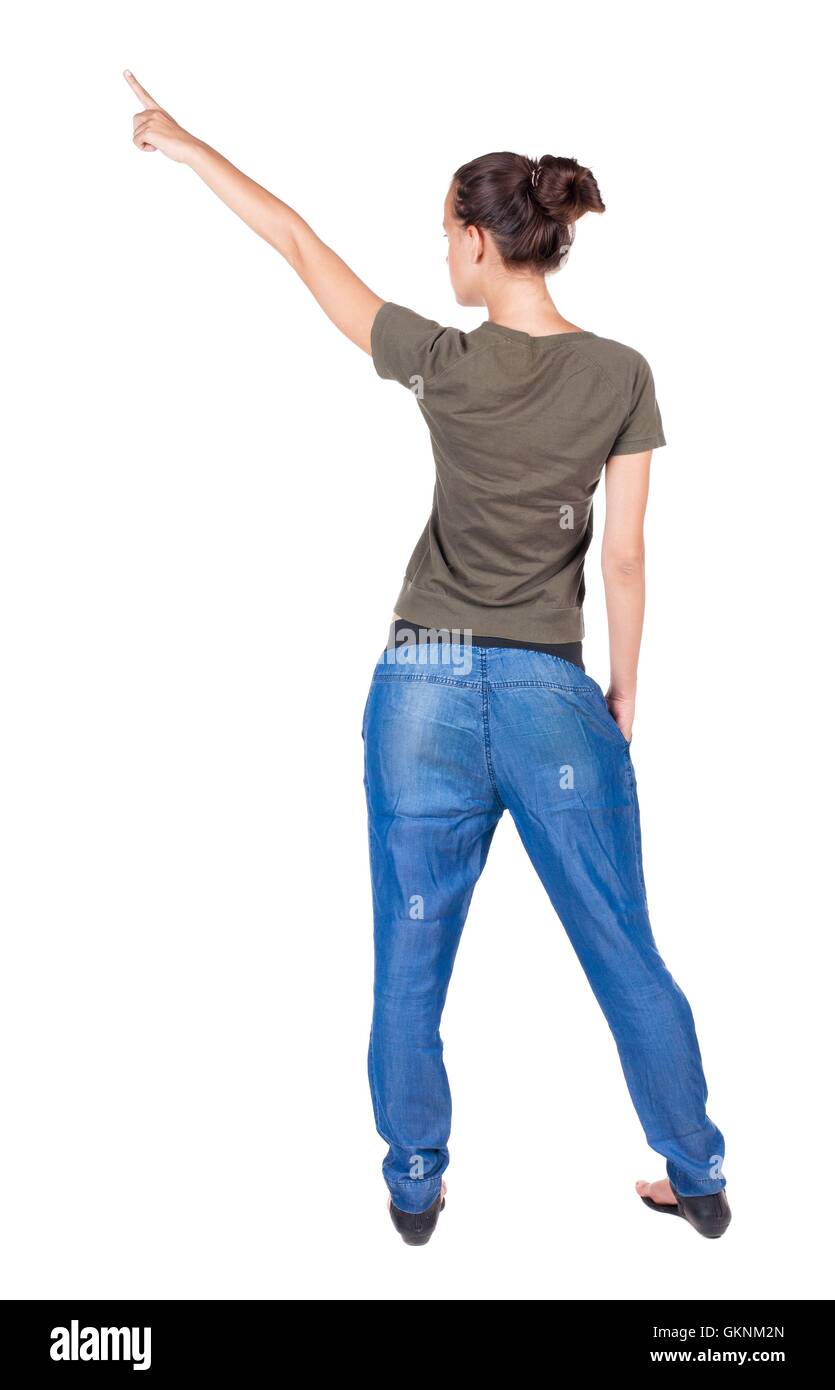Back view of pointing woman Stock Photo - Alamy