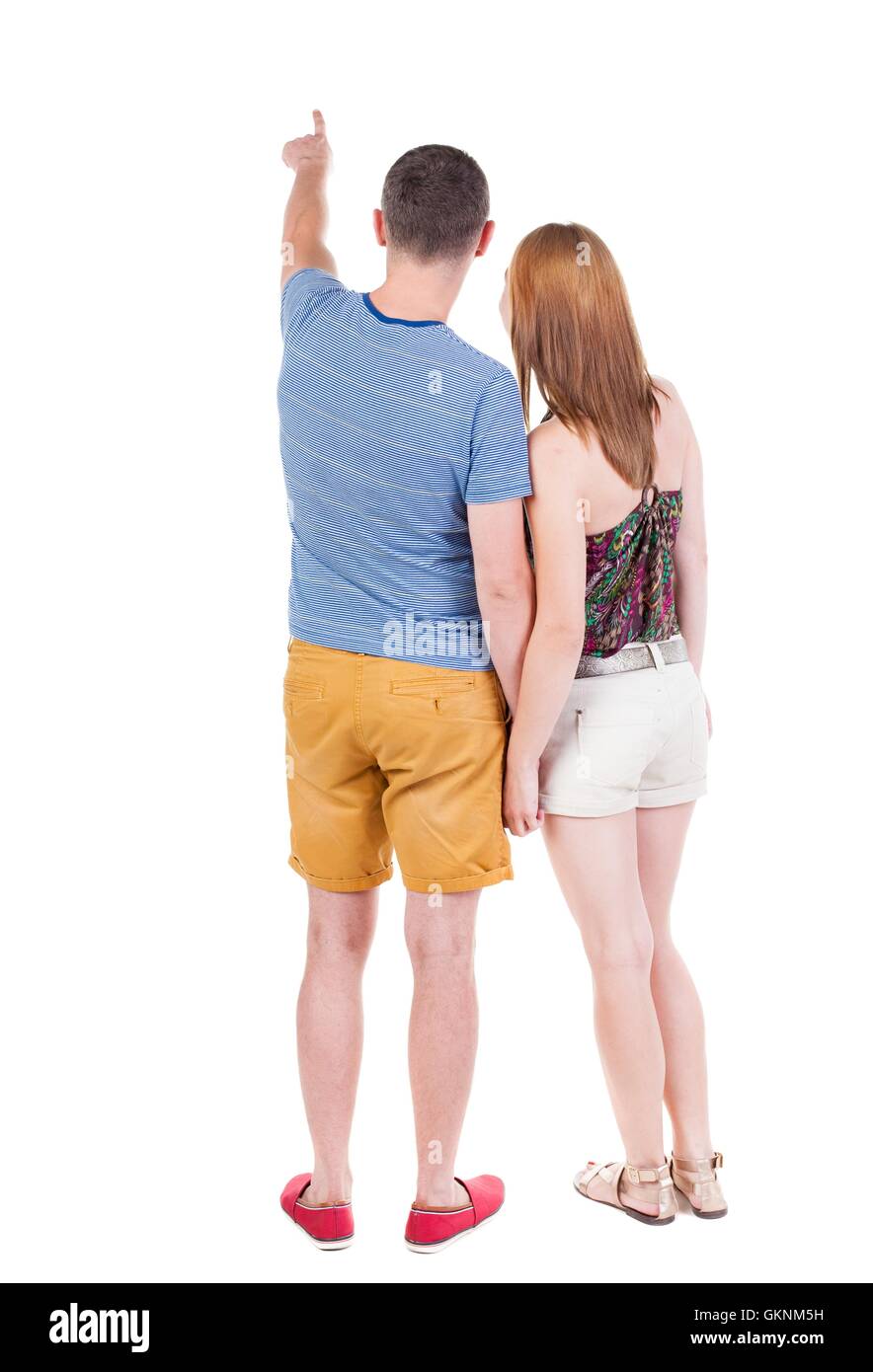 young couple pointing Stock Photo - Alamy