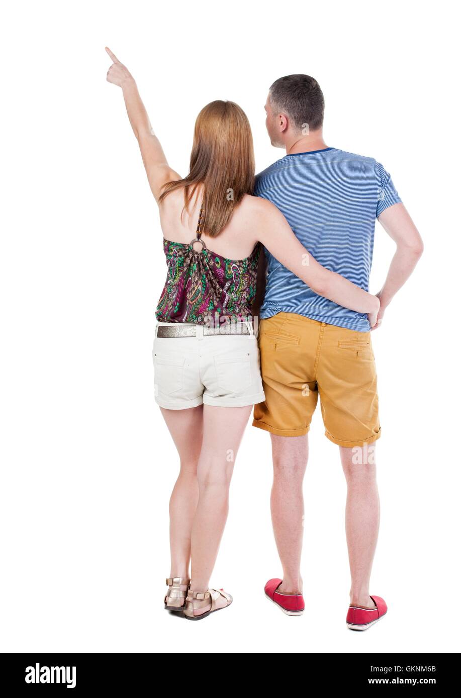 young couple pointing Stock Photo - Alamy