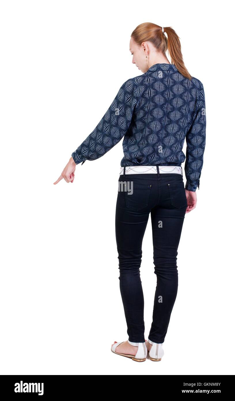 Back view of pointing woman Stock Photo - Alamy