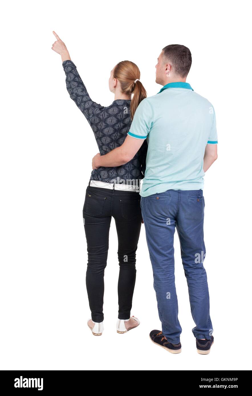 young couple pointing Stock Photo - Alamy