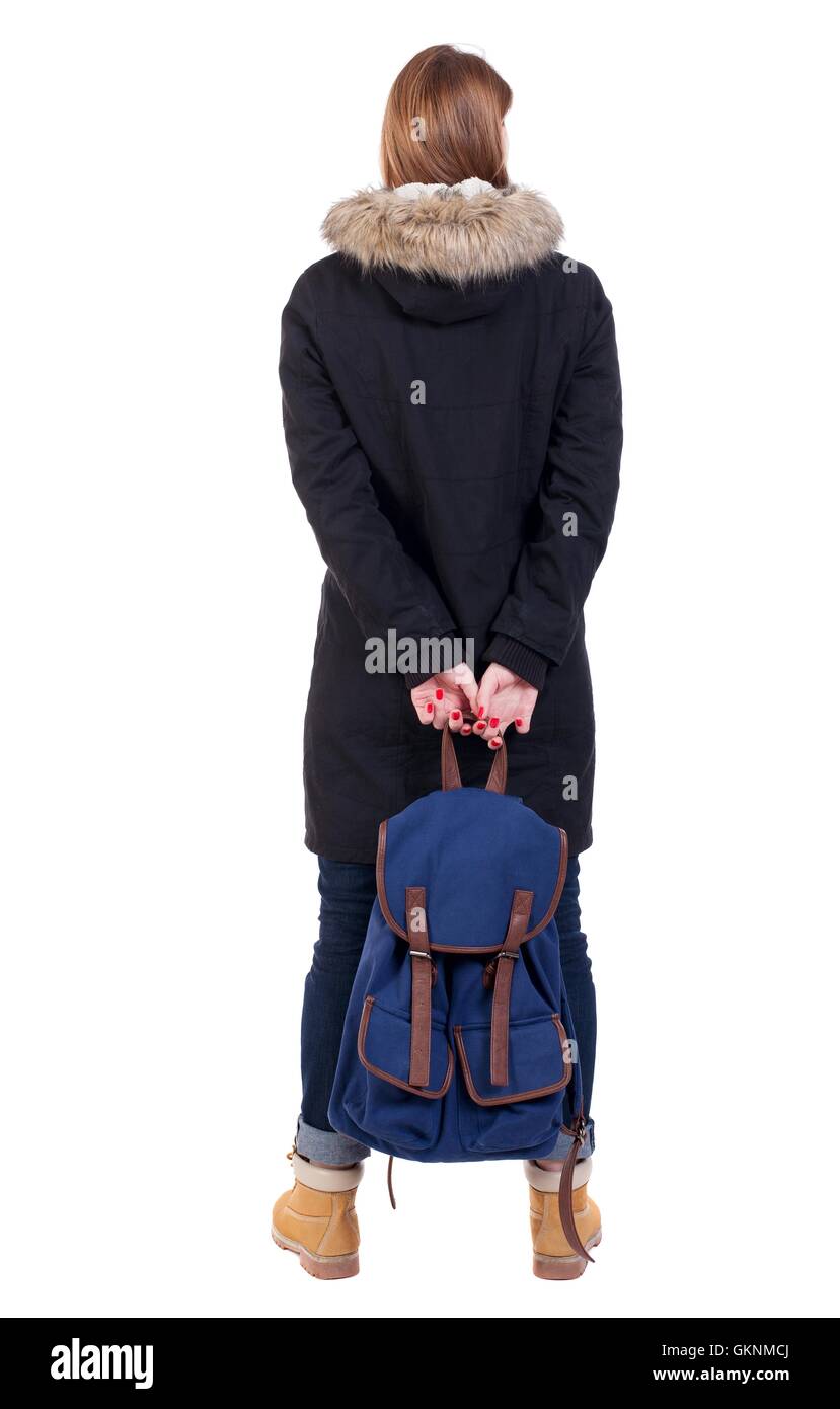 Back view woman in winter jacket with backpack Stock Photo - Alamy