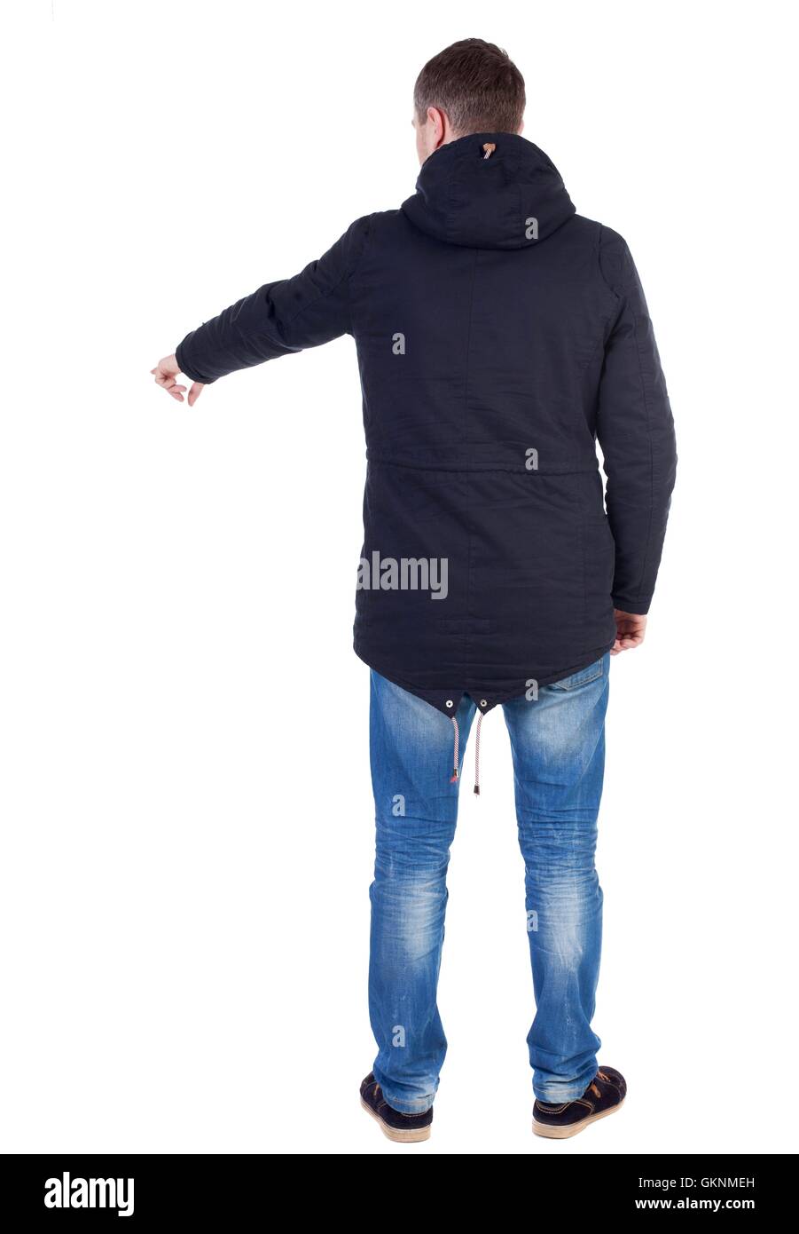 Back view of pointing young men Stock Photo - Alamy