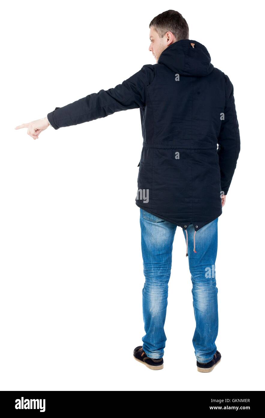 Back view of pointing young men in parka Stock Photo - Alamy