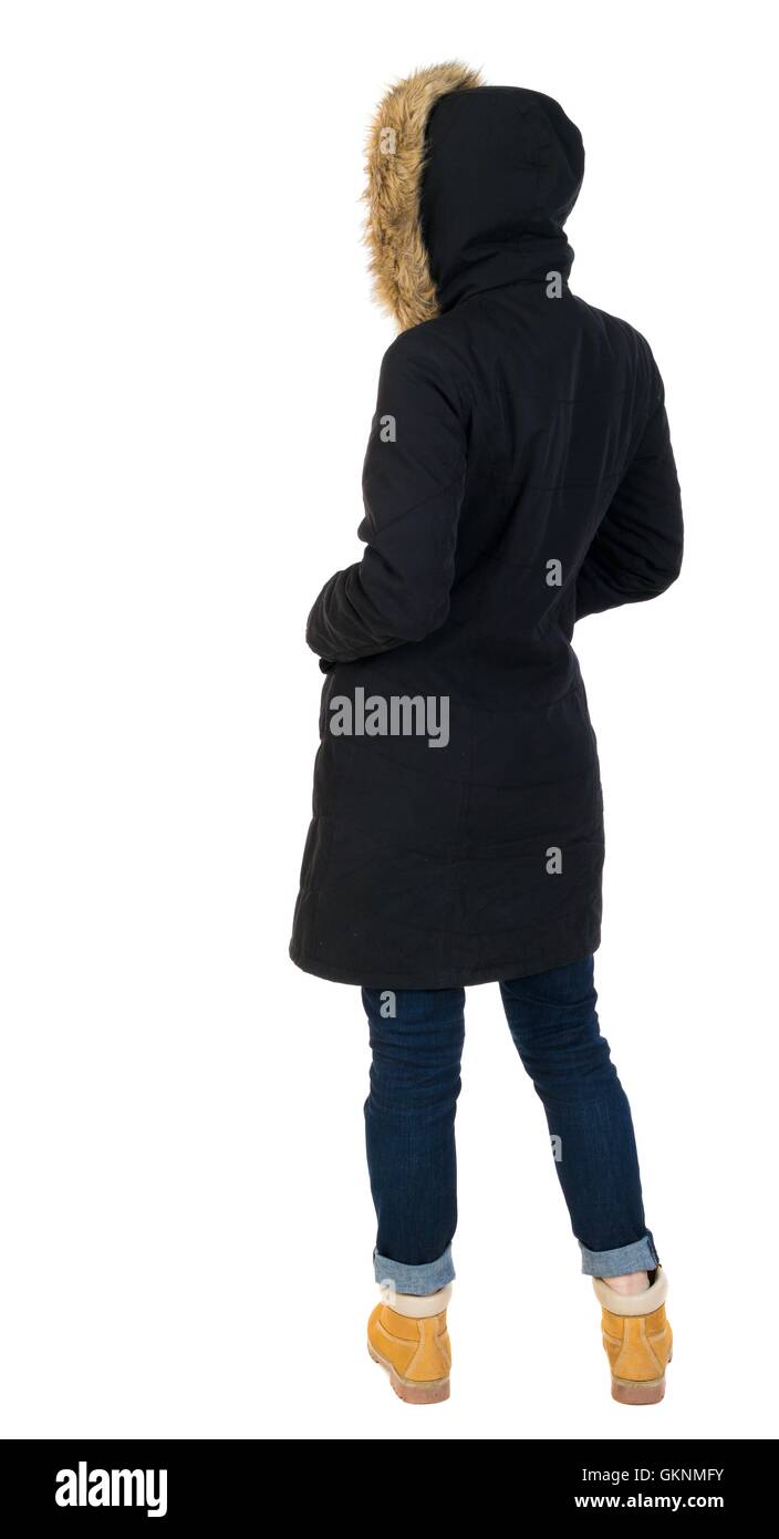 Back view woman in winter jacket looking up. Standing young g Stock ...