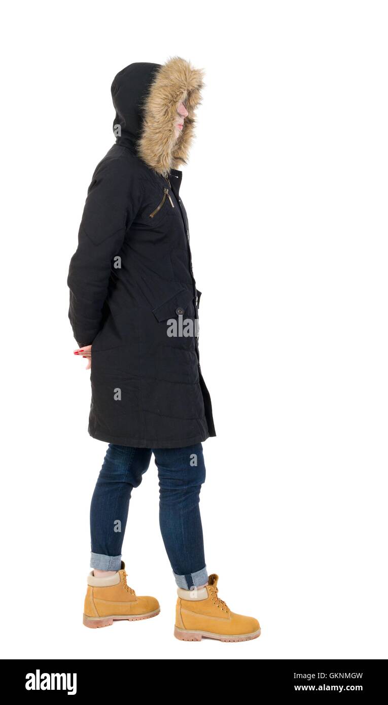 Back view woman in winter jacket looking up Stock Photo - Alamy