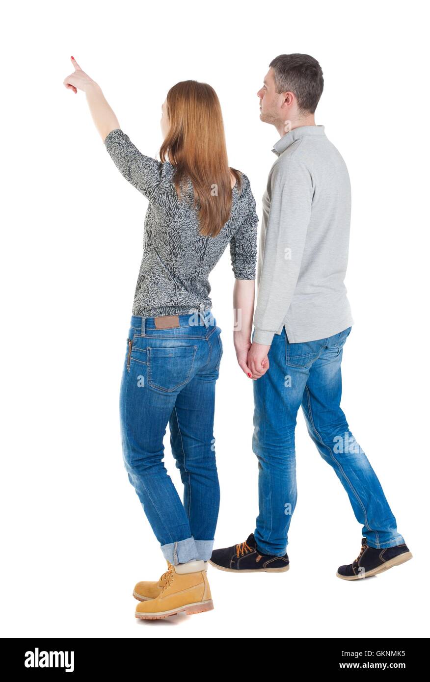 Back view of walking young couple Stock Photo - Alamy