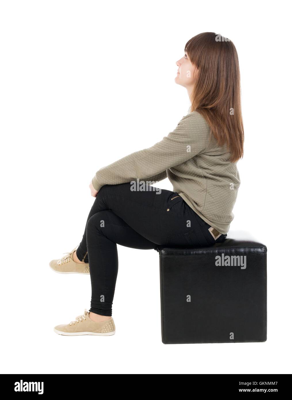 back view of young beautiful woman sitting Stock Photo - Alamy