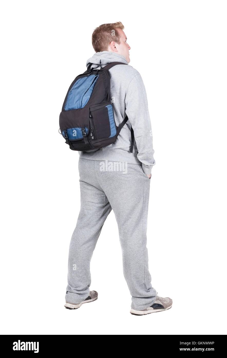 Back view of man with backpack looking up Stock Photo - Alamy