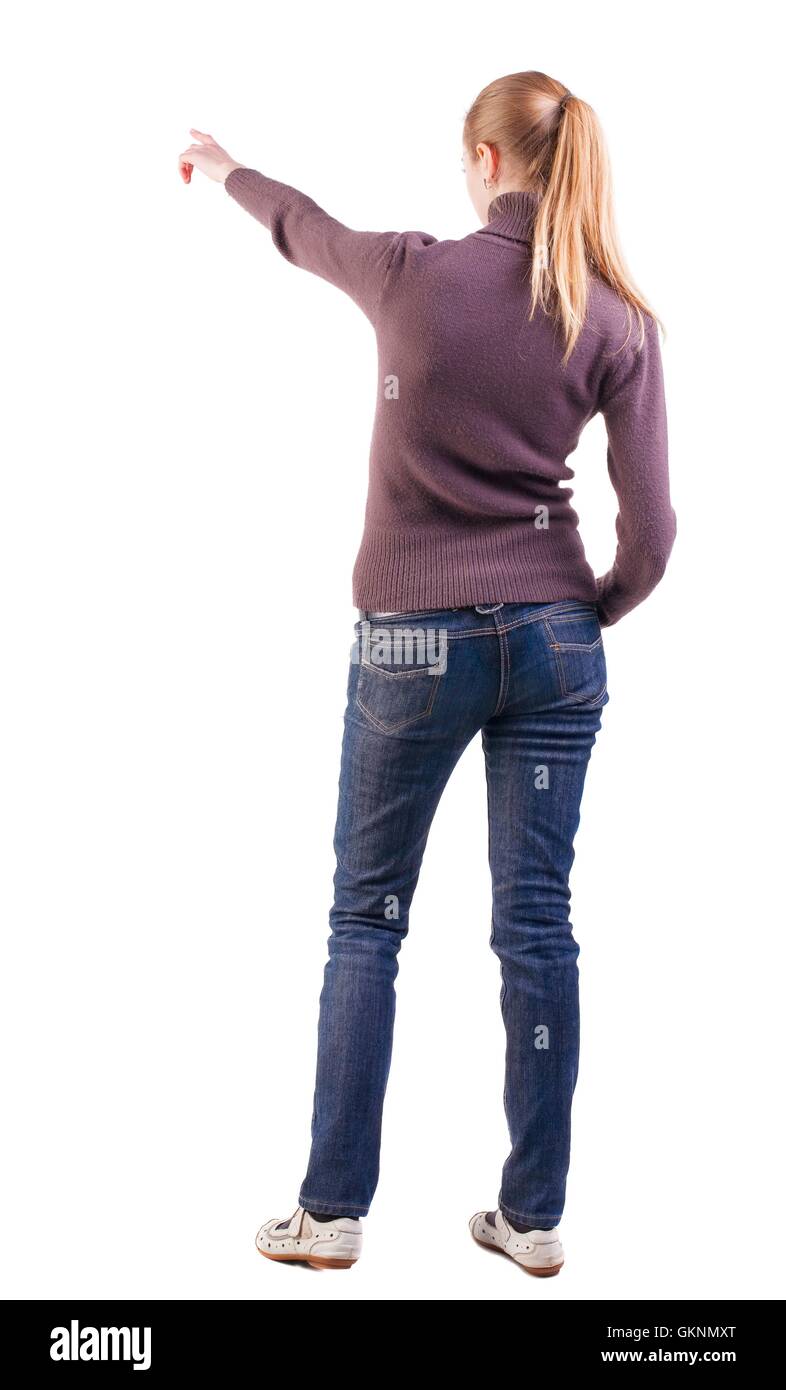 Back view of pointing woman Stock Photo - Alamy