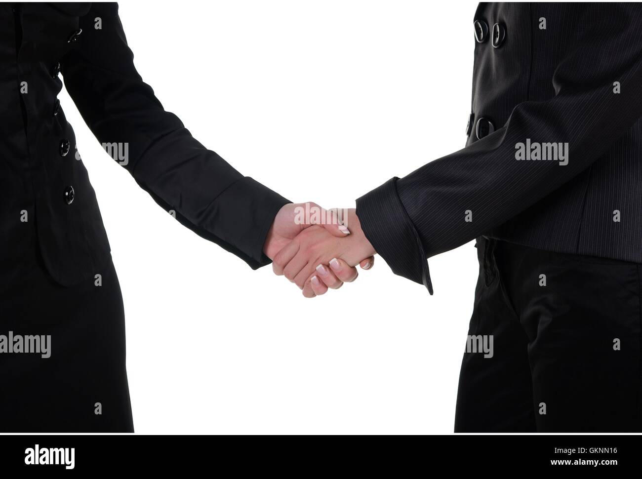 Hand shake of two women Stock Photo - Alamy
