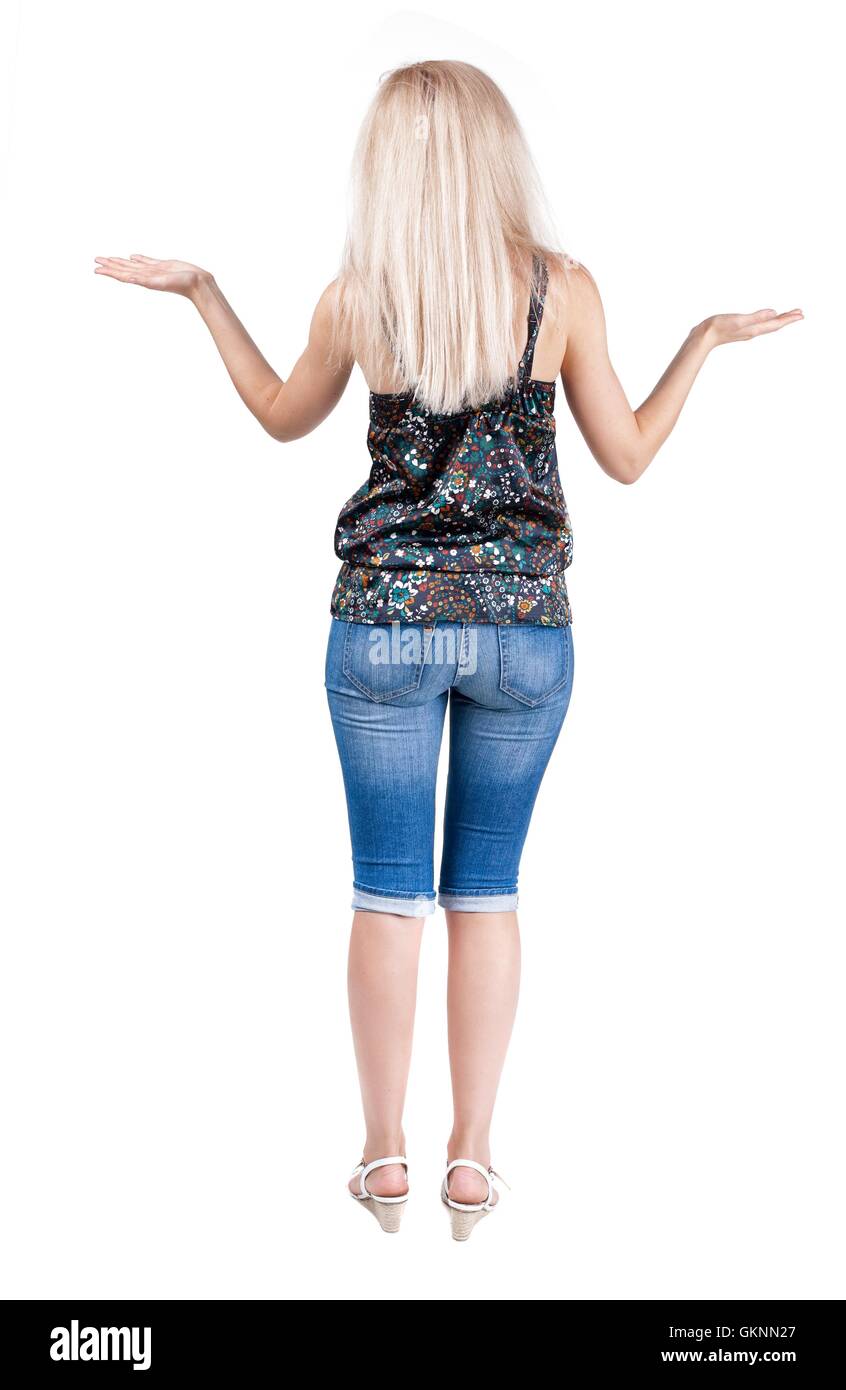 back view of surprised beautiful blonde young woman with hands Stock ...